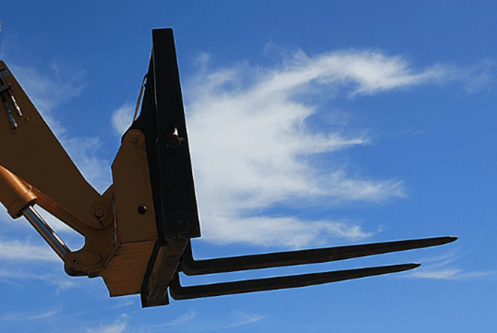 Guía para sujetar las horquillas de paletas de tractores para ...